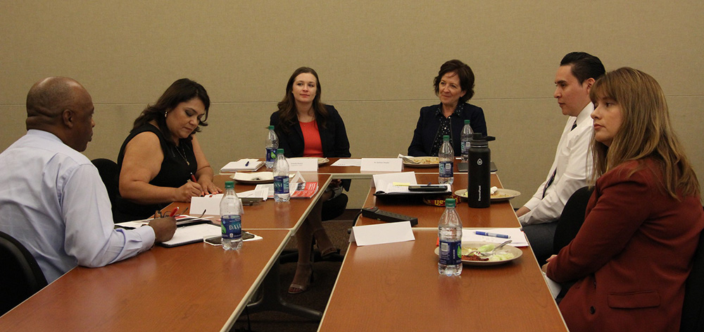 Group sits at the roundtable for discussion | Sonya Christian's Blog